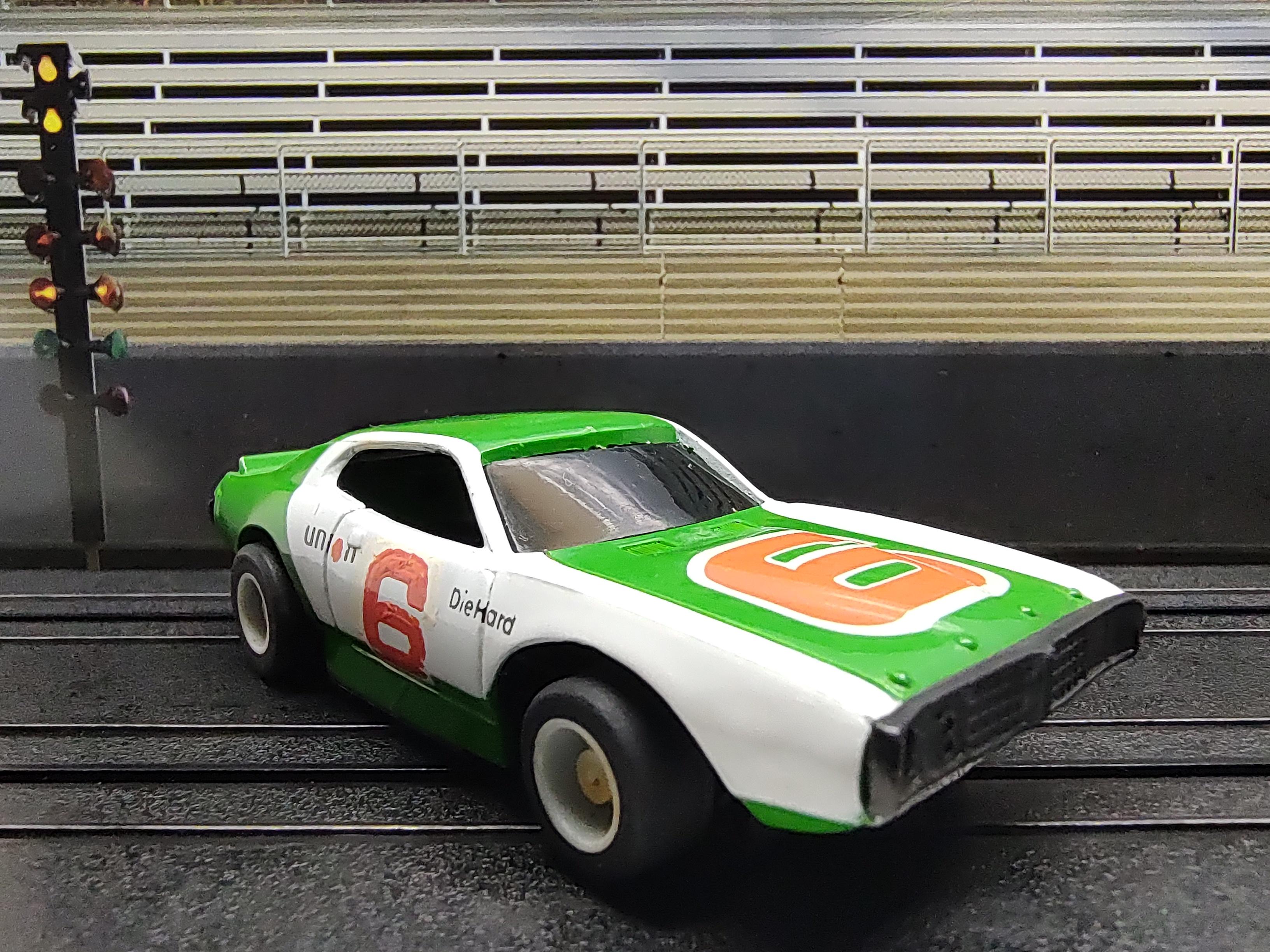 Tyco #6 Diehard Dodge Charger HP7 HO Slot Car. (VIDEO) - CTW Auctions ...
